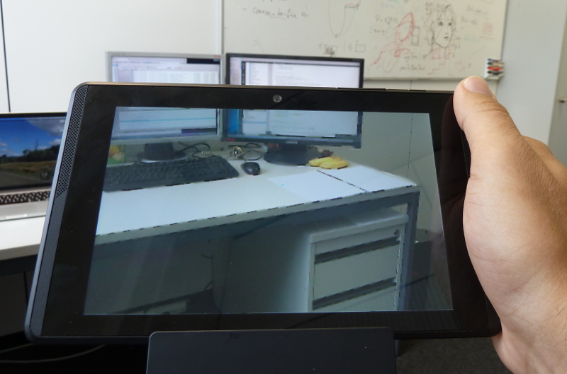 Real-Time View Correction for Mobile Devices